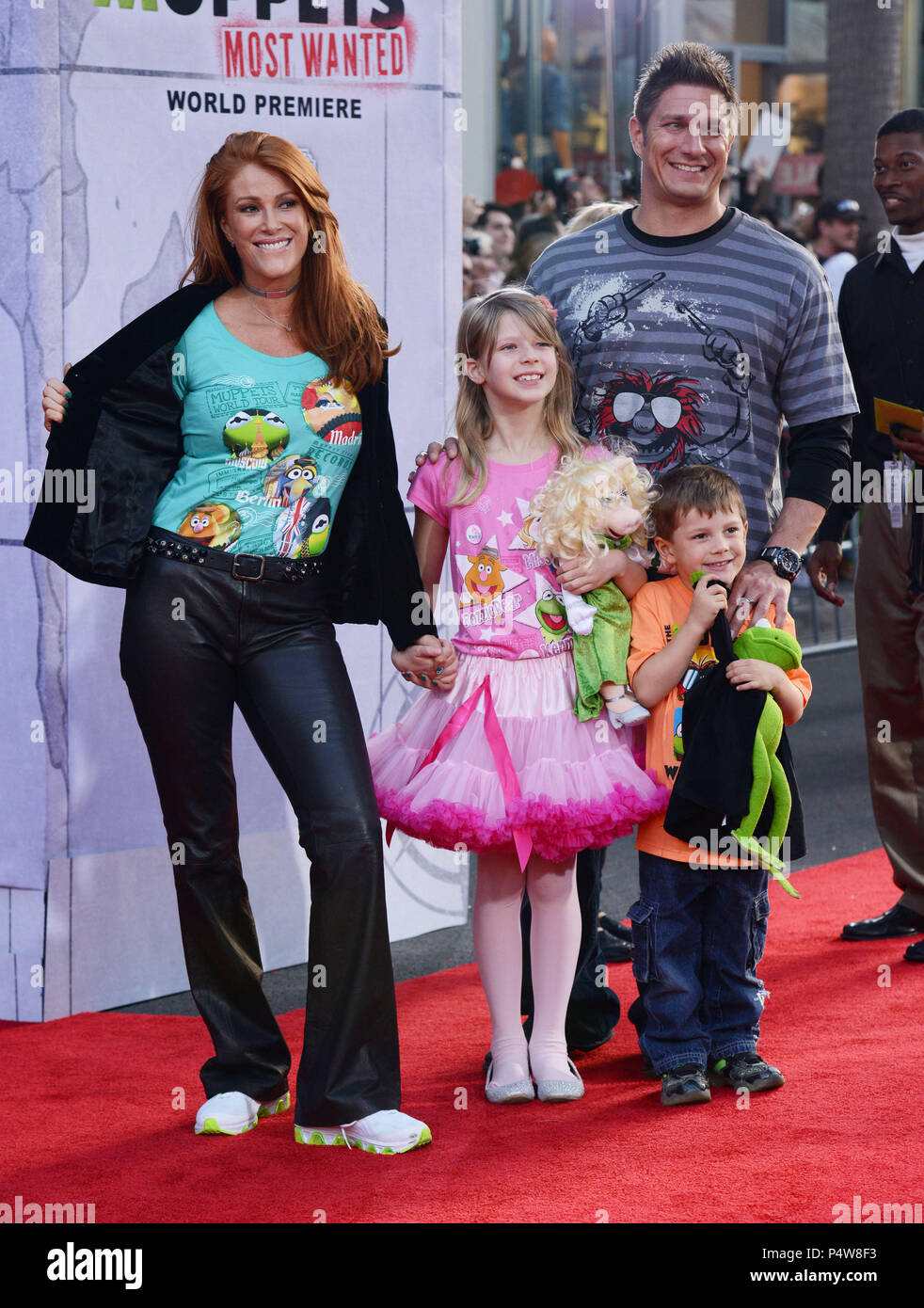 Angie Everhart and family arriving at the Muppets Most Wanted Premiere ...