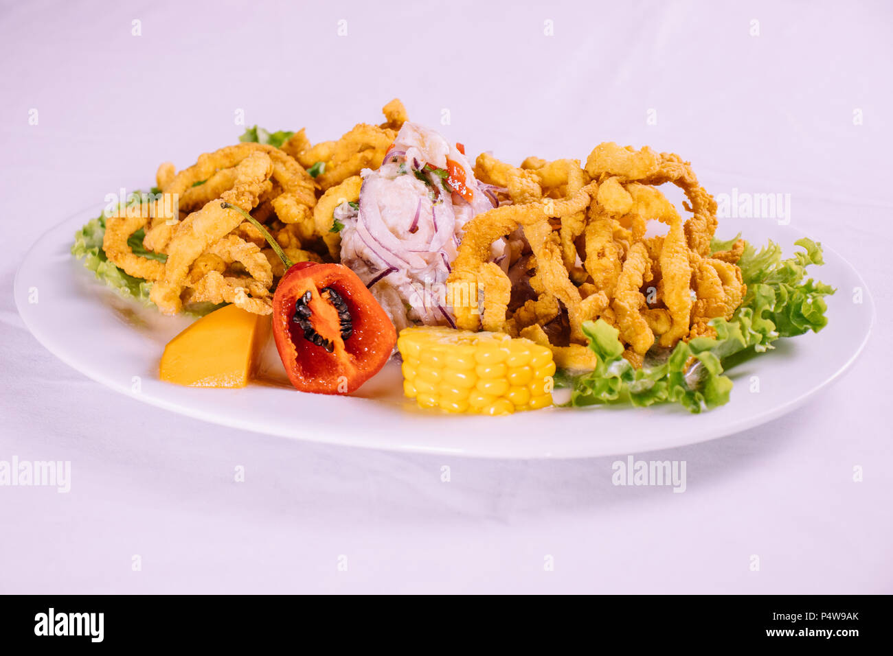 peruvian food: ceviche de pescado con calamar Stock Photo - Alamy