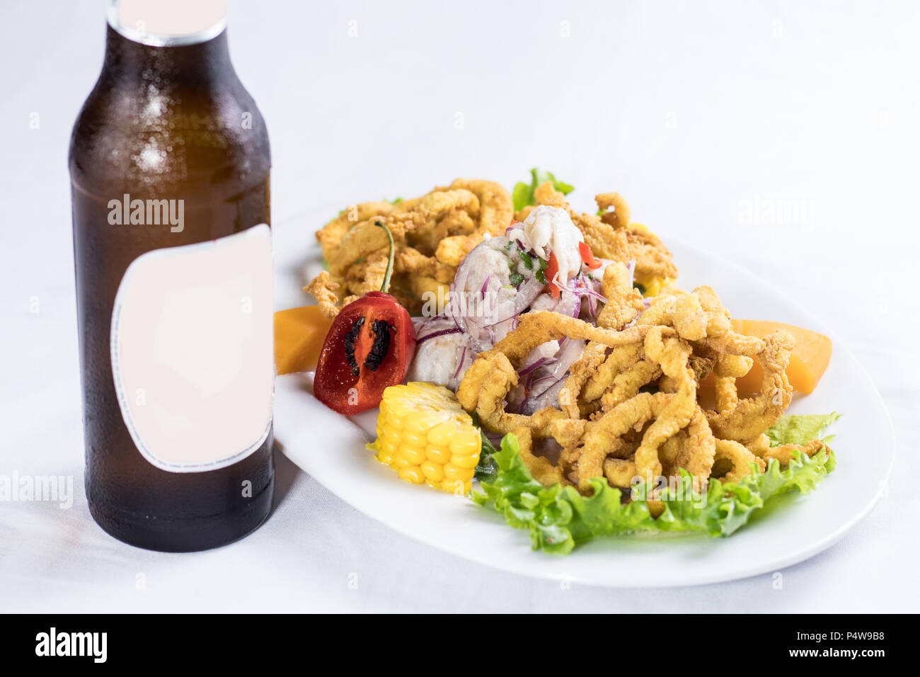 peruvian food: ceviche de pescado con calamar Stock Photo - Alamy
