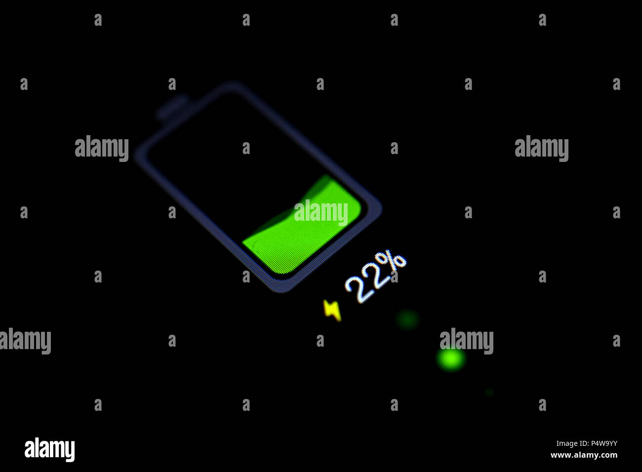 battery level indicator on a smartphone,black background,image of a ...