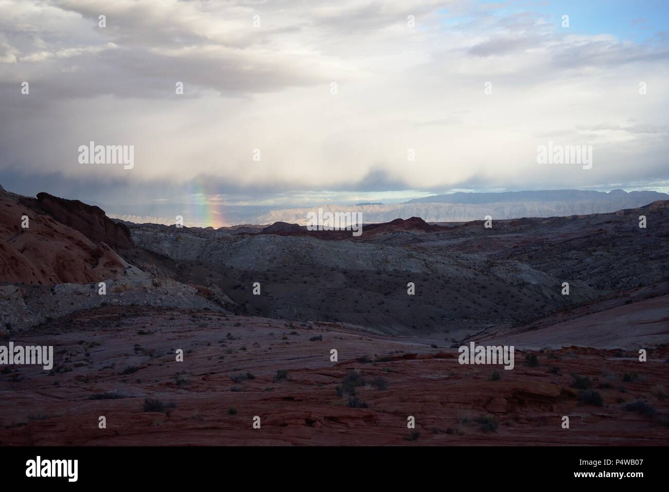 A rainbow over valley of fire state park Stock Photo - Alamy