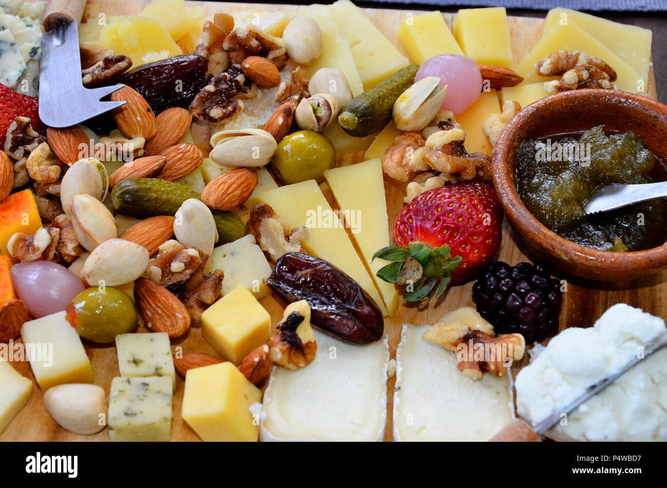 Cheese plate - Appetizer and snack Stock Photo - Alamy