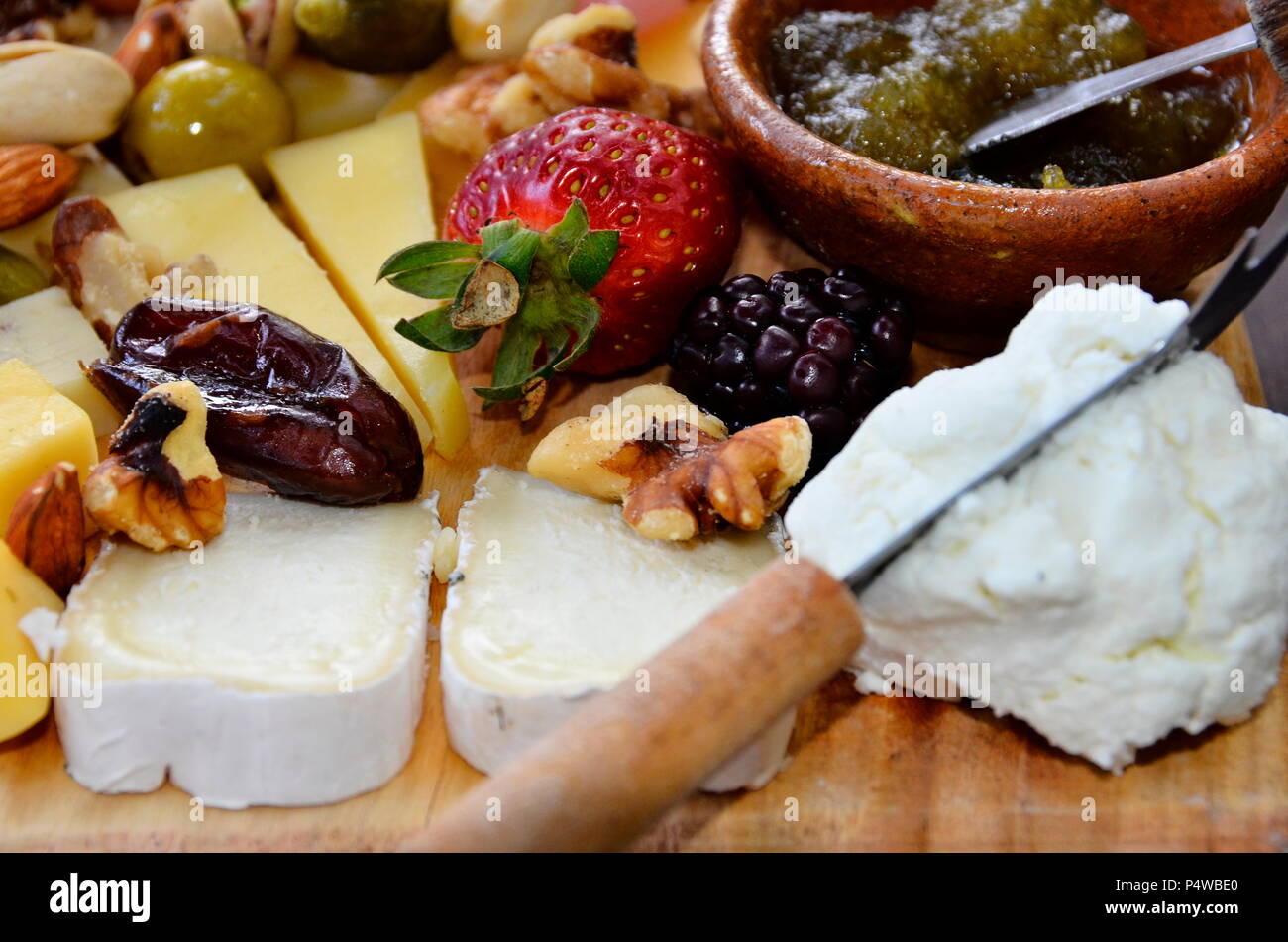 Cheese plate - Appetizer and snack Stock Photo - Alamy