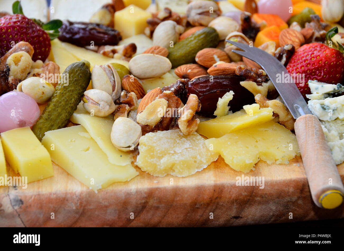 Cheese plate - Appetizer and snack Stock Photo - Alamy