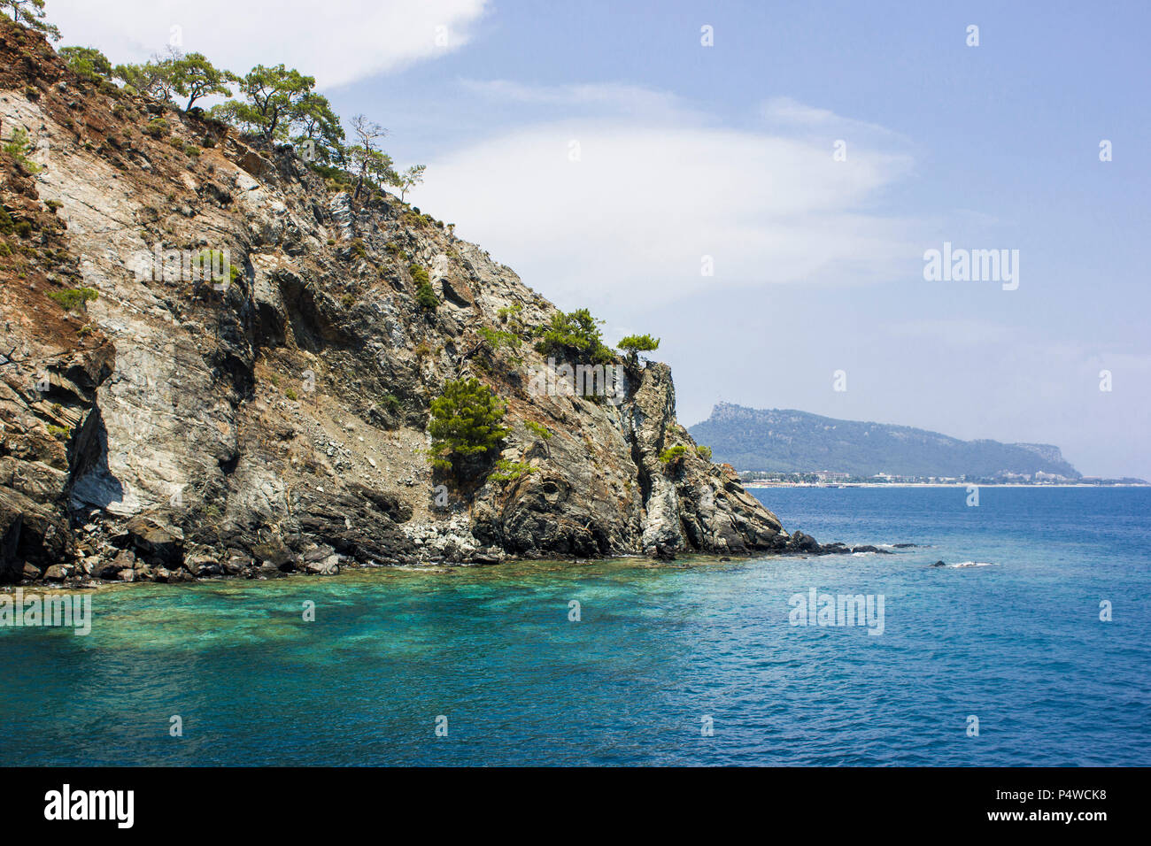 Calm Mediterranean Sea and mountains with the green trees in Antalya ...
