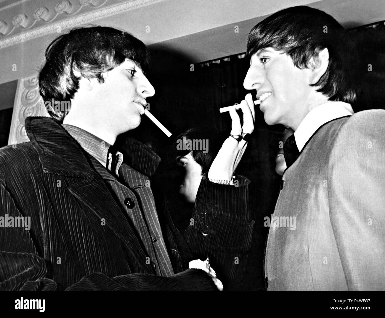 The Beatles. Ringo Starr offers a cigarette to Ringo. Effigies of The ...