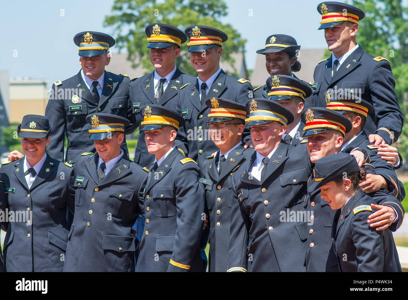 A group of brand new U.S. Army second lieutenants pose for pictures ...