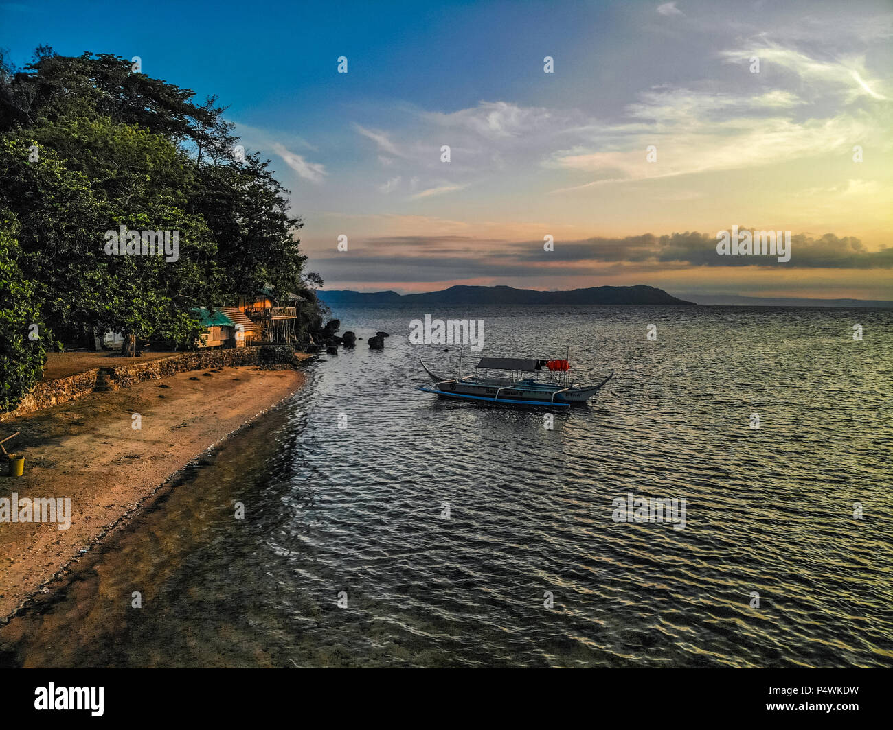 Early morning golden hour sunset in front of a beach resort in ...