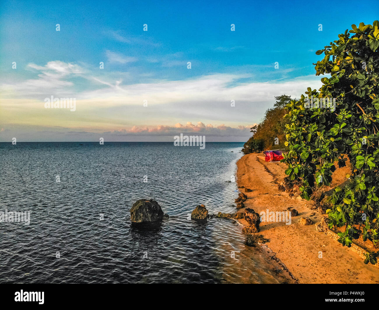 Early morning golden hour sunset in front of a beach resort in ...