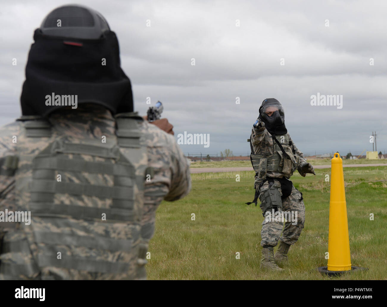 Airmen 1st Class Christopher Benson and Brenton White, response force ...