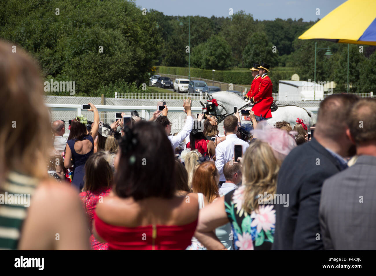 Crowds standing watching the races as Royal Ascot in Windsor enclosure ...
