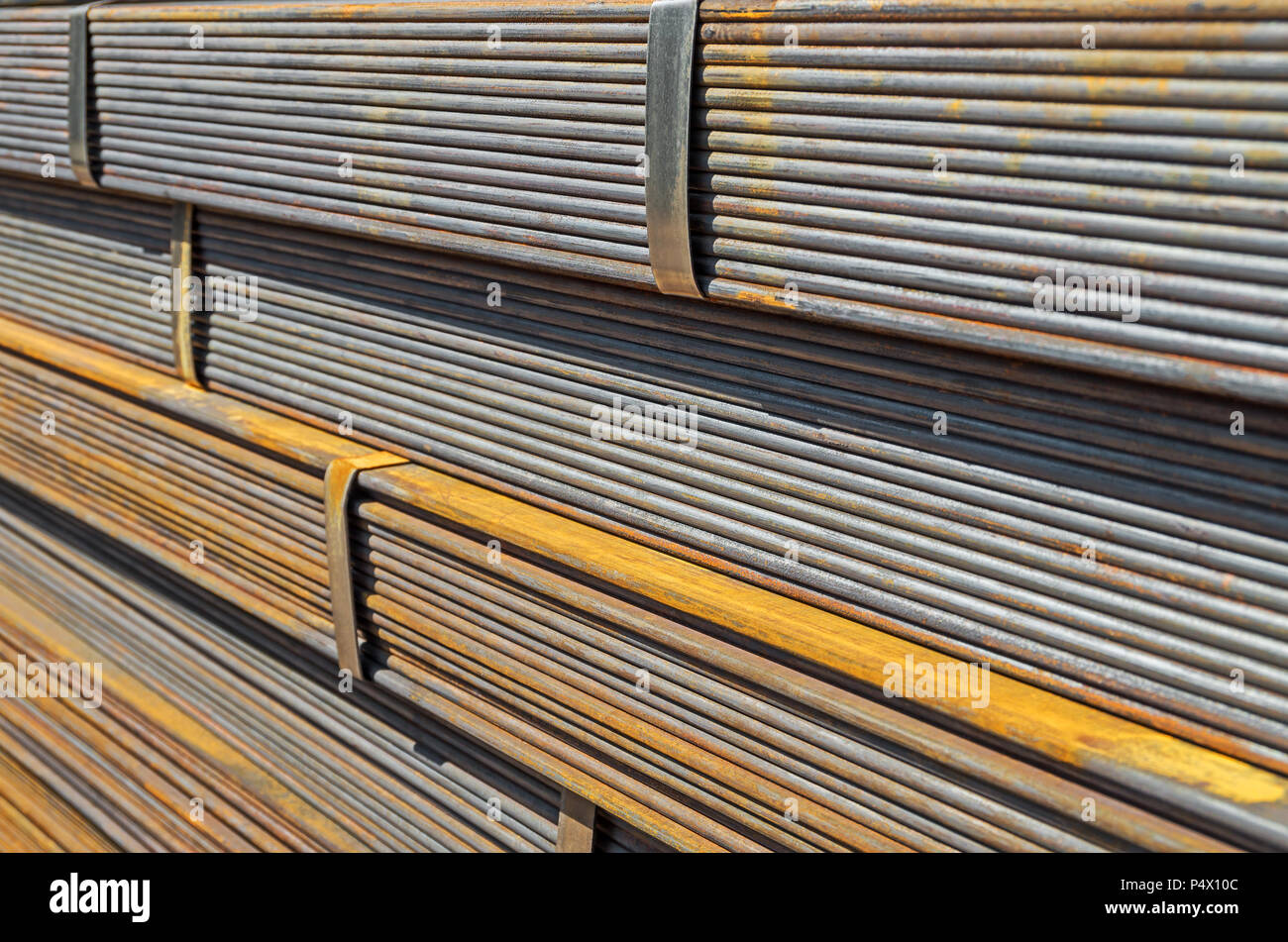 The rusty hot-rolled sheet metal in packs at the warehouse of metal ...