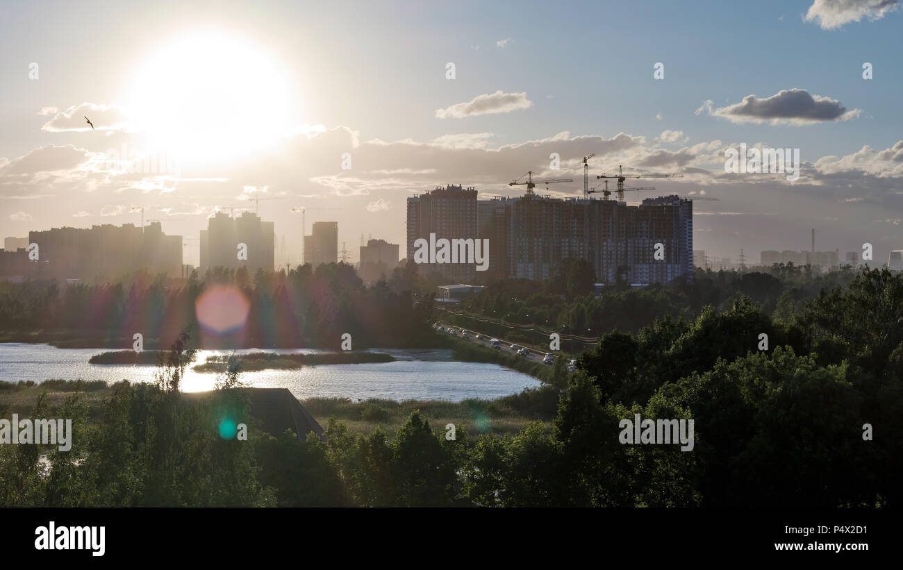 Crane and building construction. Panoramic view on new district in ...