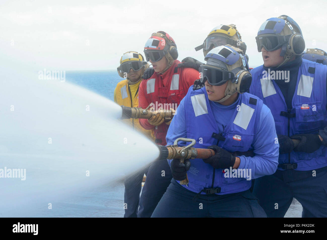 OCEAN (May 9, 2017) Air department Sailors fight a simulated fire ...