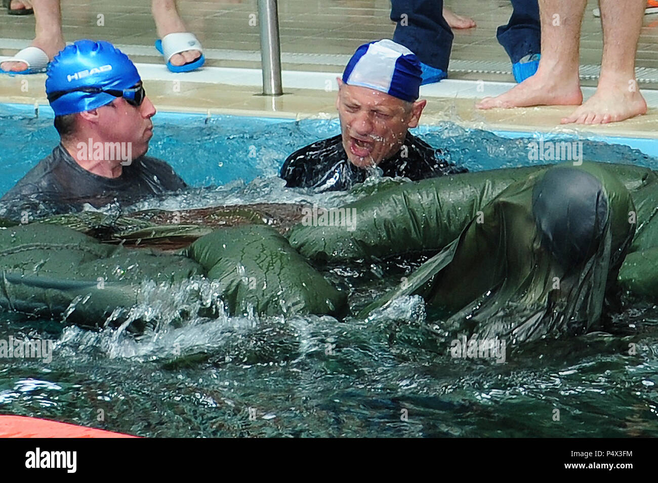 Three Italian Paratroopers from Italian Army Folgore Brigade perform ...