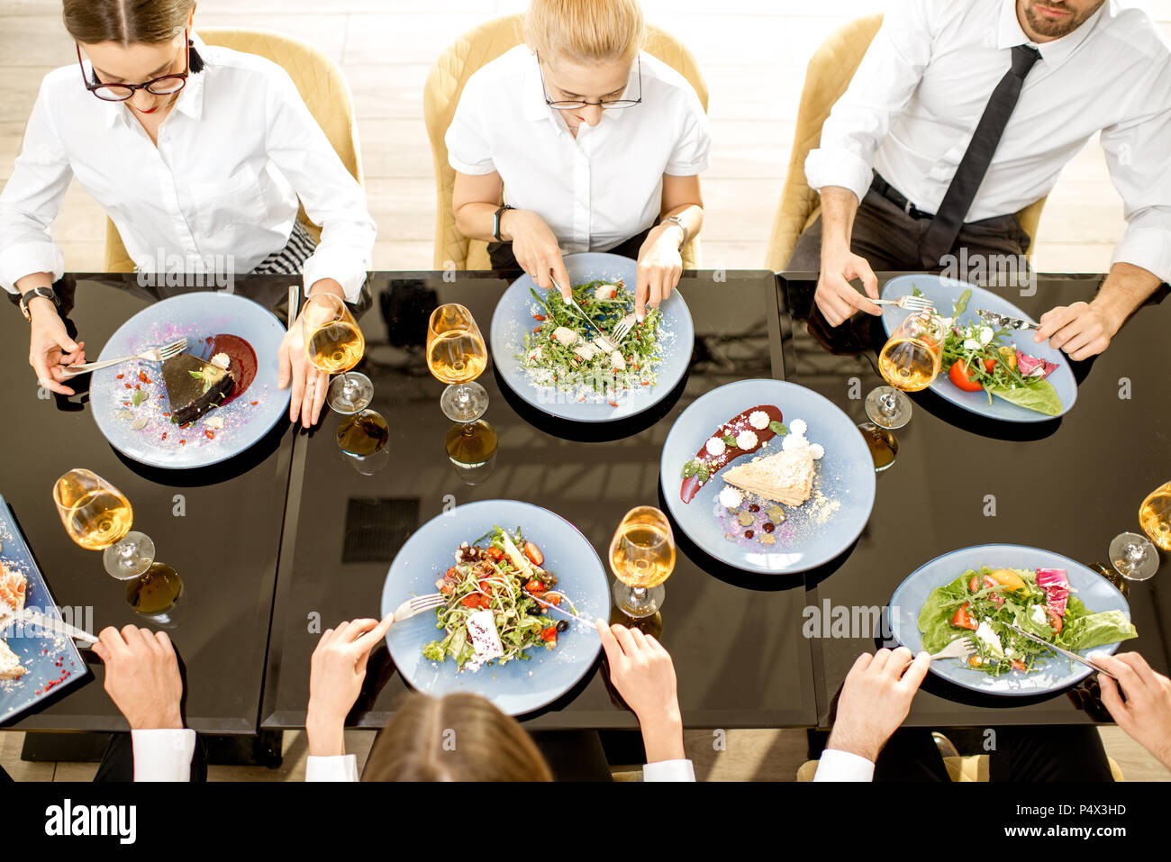 People during eating delicious food hi-res stock photography and images ...