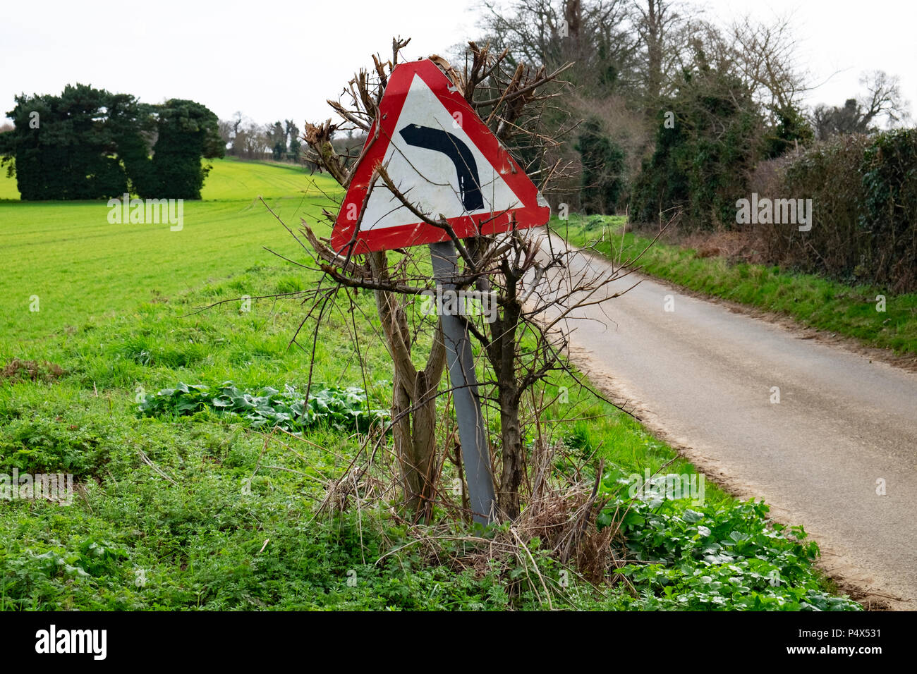 Sharp bend road sign hi-res stock photography and images - Alamy