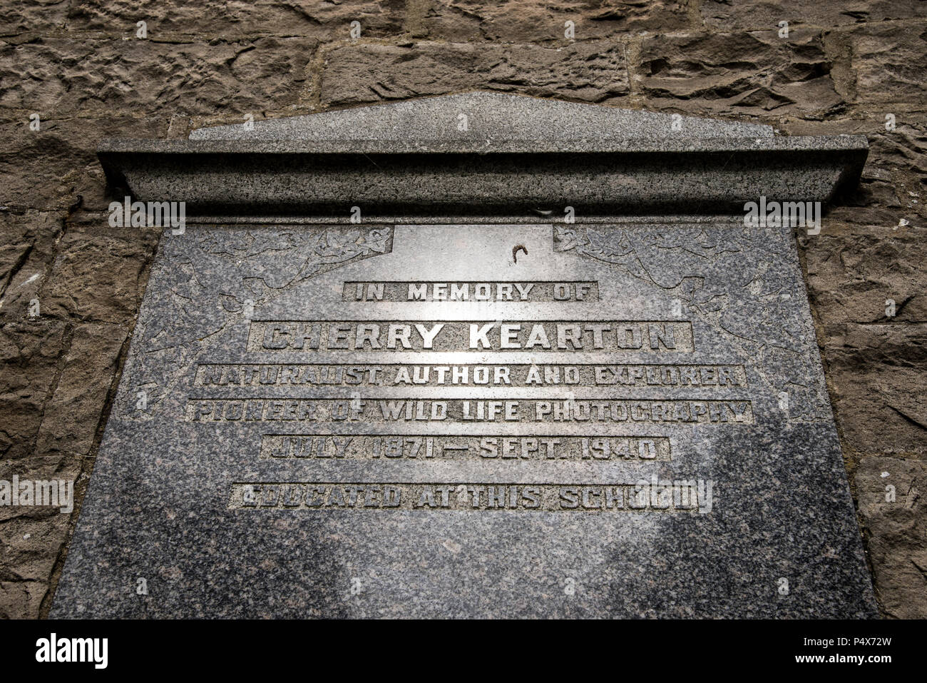 Memorial plaque to Cherry Kearton, wildlife photographer on the wall of ...
