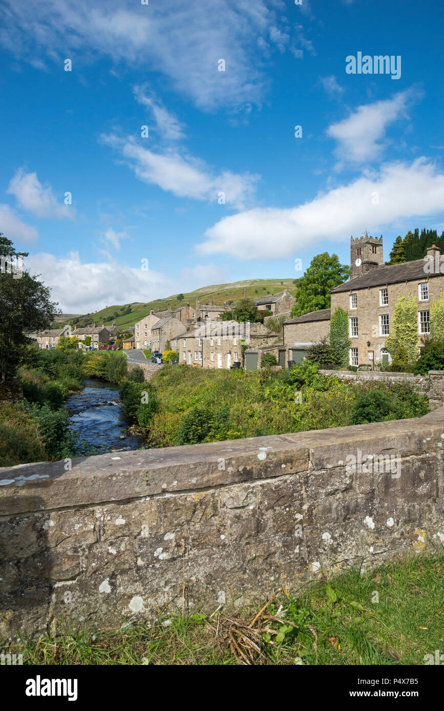 View from the bridge over the river Swale at Muker village, Swaledale ...