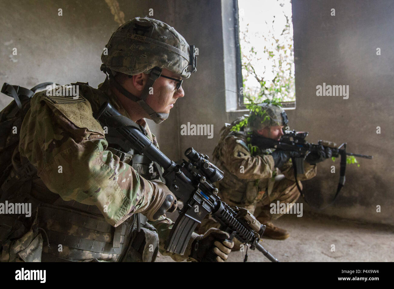 U.S. Army Soldiers, assigned to Multinational Battle Group-East’s ...