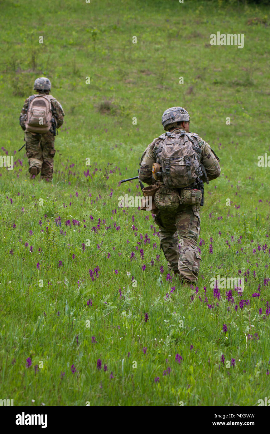 U.S. Army Soldiers, assigned to Multinational Battle Group-East’s ...