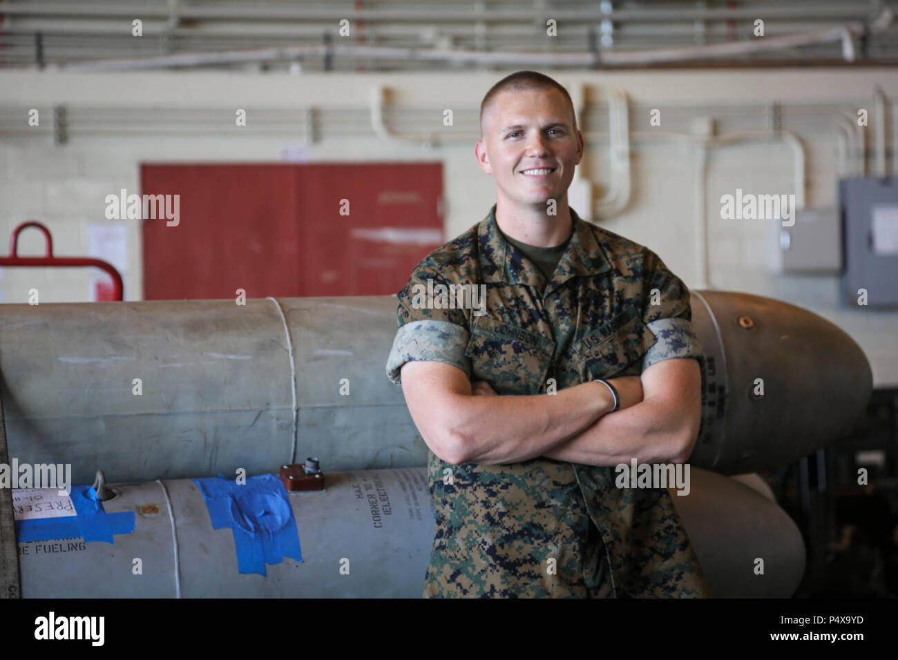 U.S. Marine Corps Sgt. Justin Tyler Johnson receives the Jack W ...