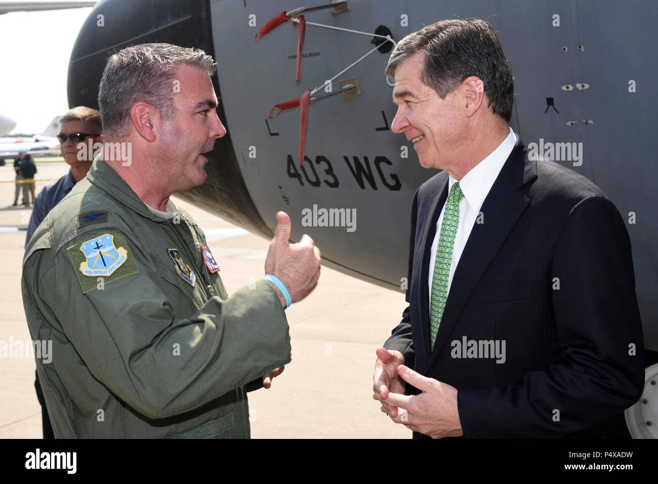 Col. Brian May, 403rd Wing Operations Group commander, talks with North ...