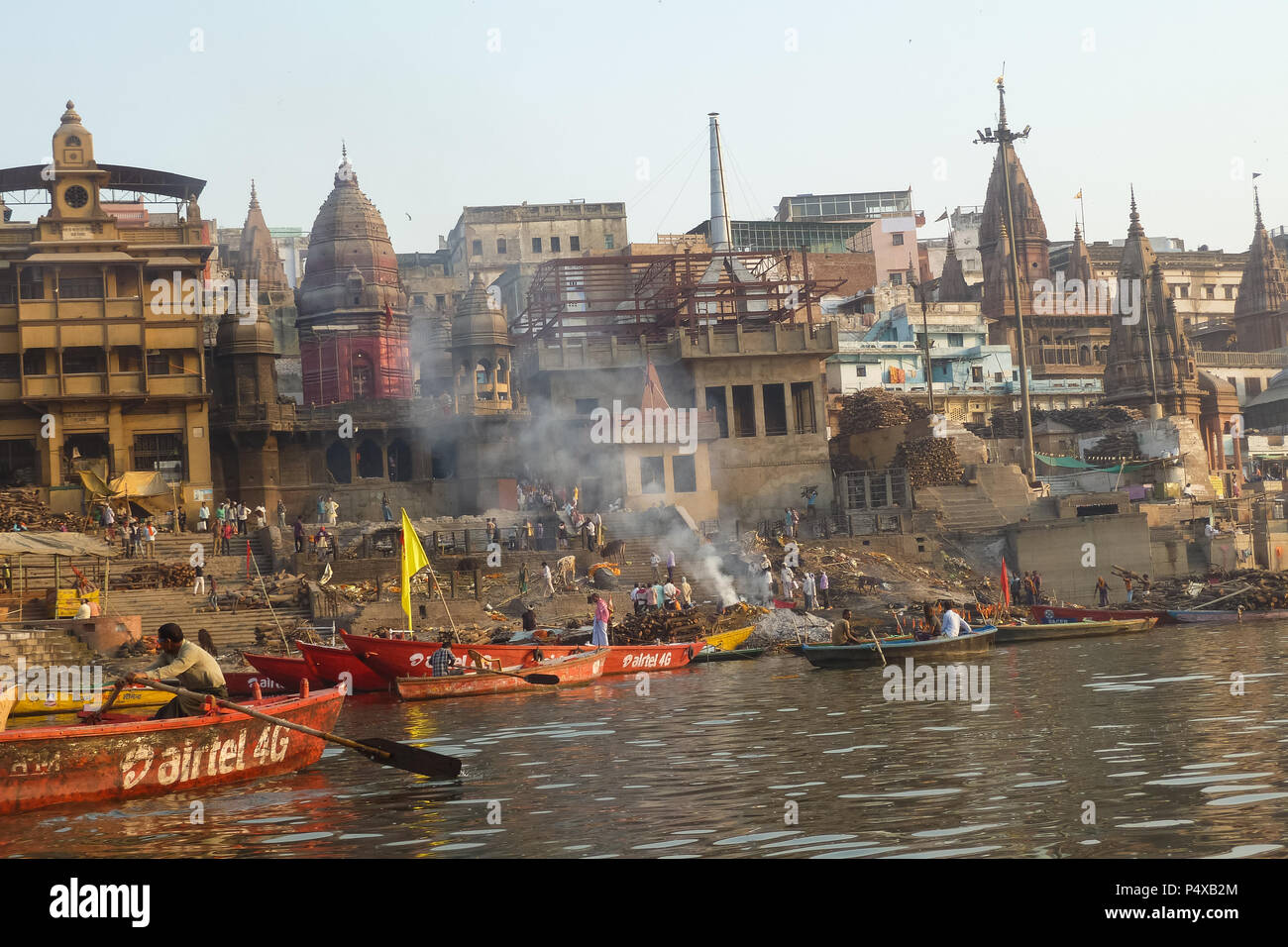 the burning ghats on the shore of river Ganges, Varanasi, India Stock ...