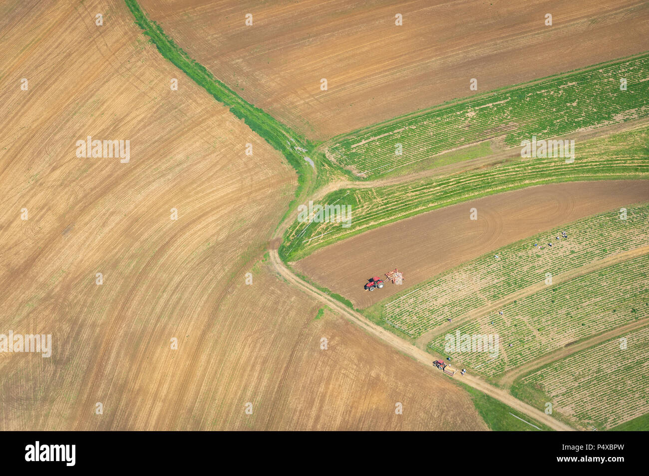 Tractor plowing agricultural fields aerial hi-res stock photography and ...