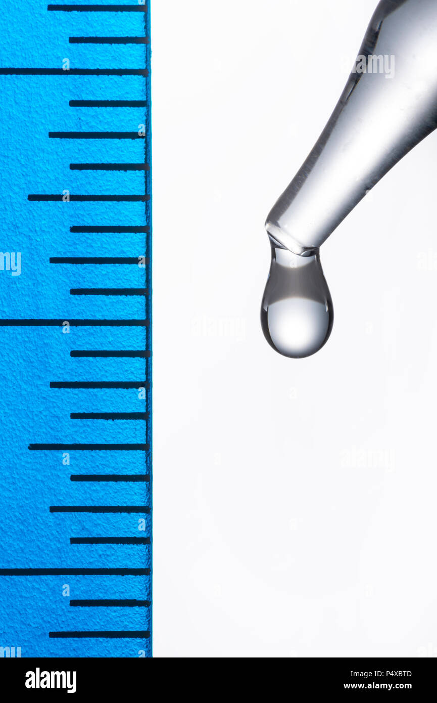 Tiny Chemical drip Being Dispensed By Pipette In Lab Stock Photo - Alamy