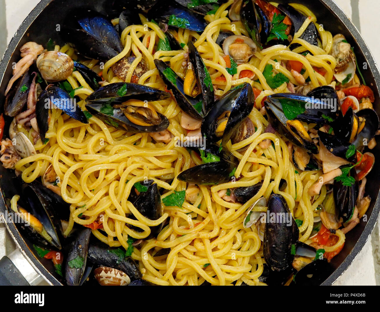 top view spaghetti pasta with seafood pan Stock Photo - Alamy