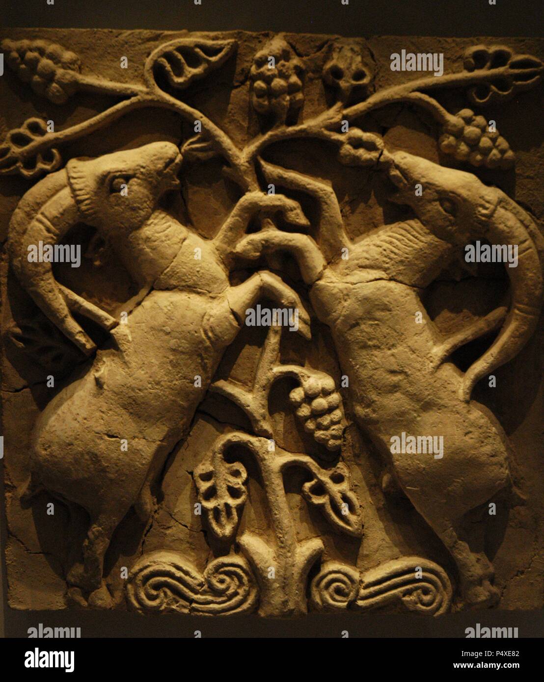 Relief depicting two billy goats next to a vine. 6th-7th centuries ...