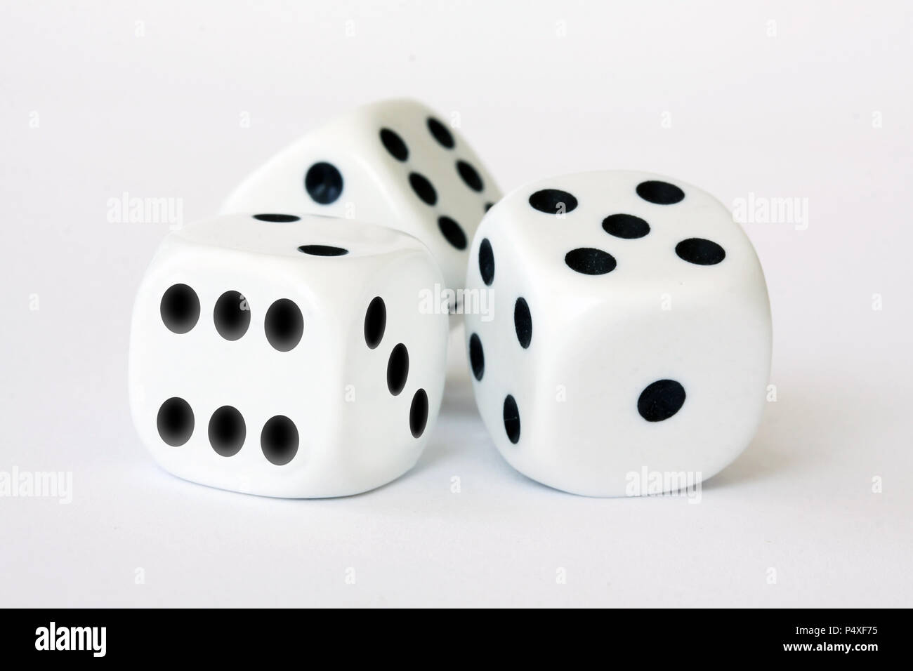 Three dice on white background - close up macro stock photography Stock ...