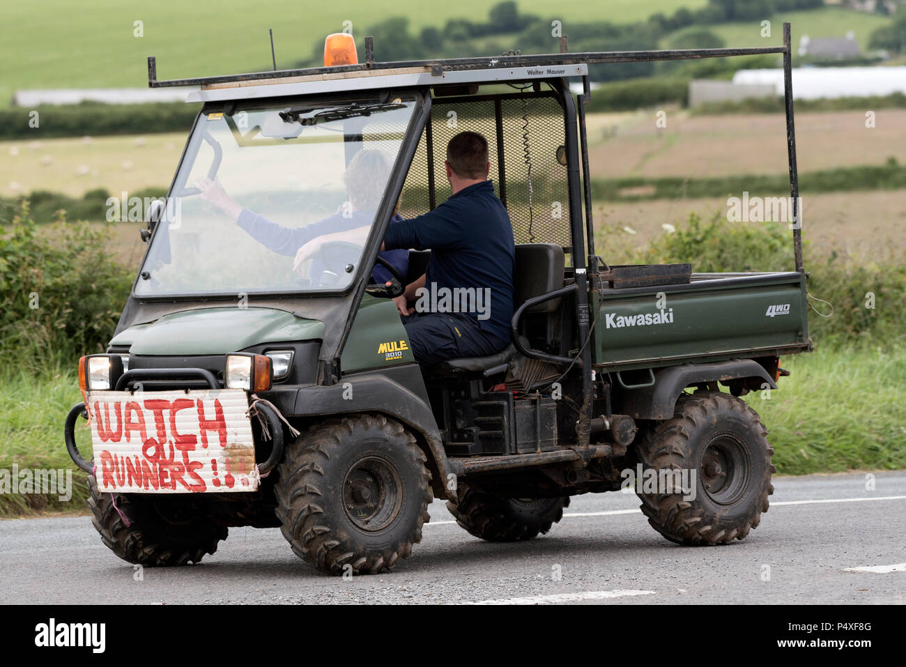 Bigbury South Devon, England UK. A small 4x4 farm vehicle displaying ...