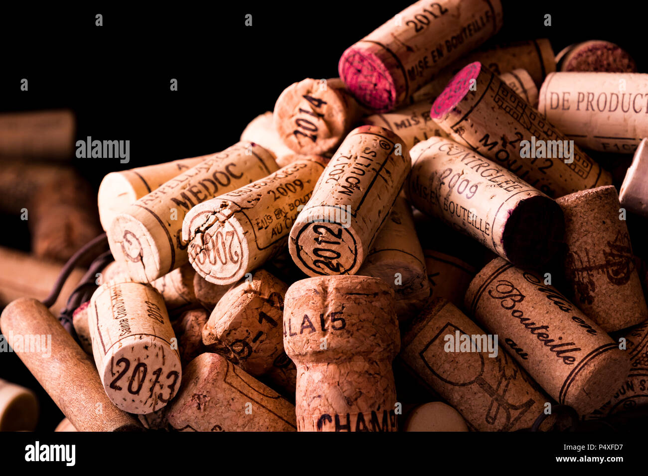 old cork stoppers of French wines in a wire basket Stock Photo - Alamy
