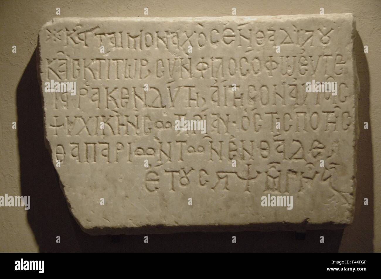 Marble slab with funerary inscription in greek. Dated in the year 1235 ...