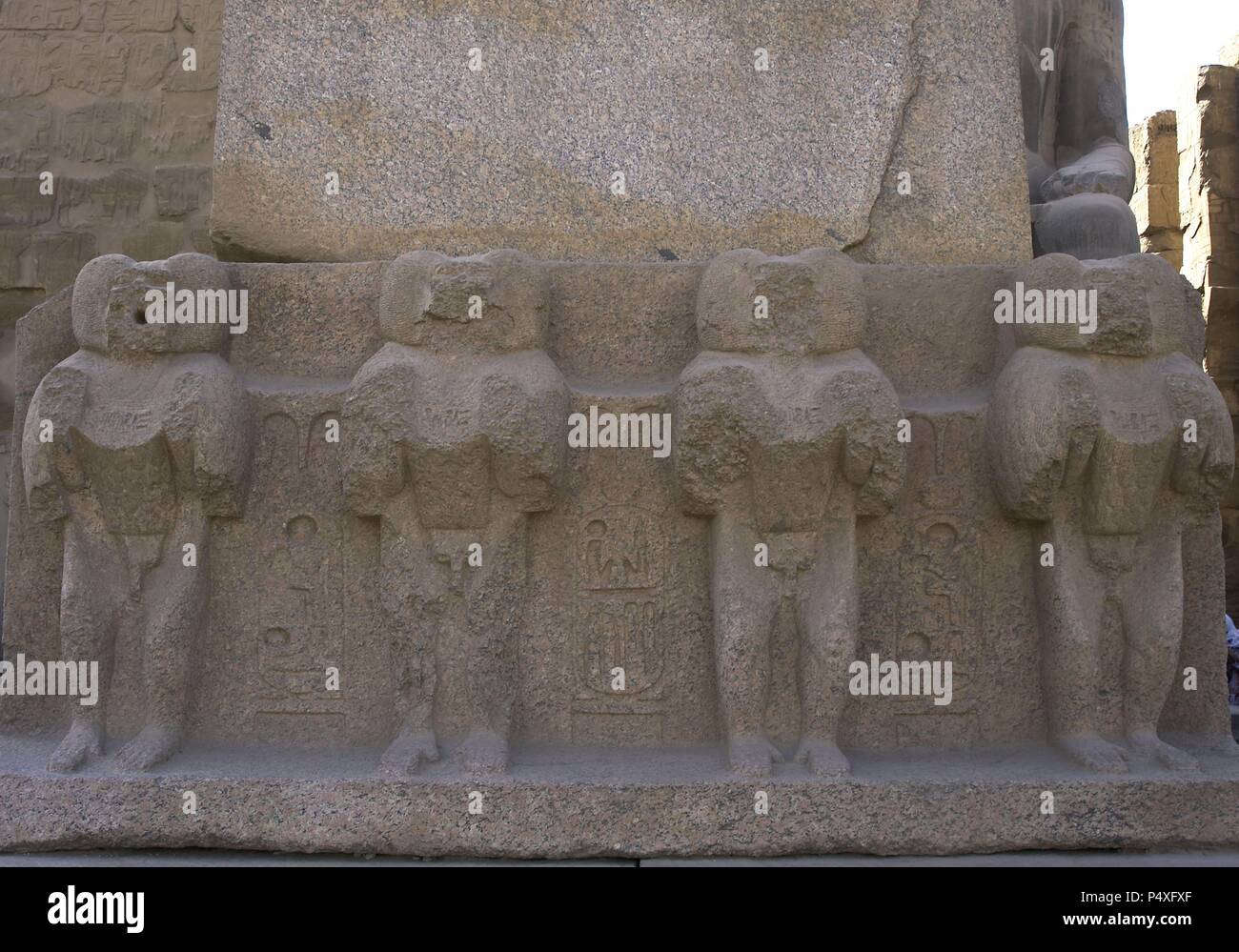 Egypt. Temple of Luxor. Mandrills relief into the base of the Obelisk ...