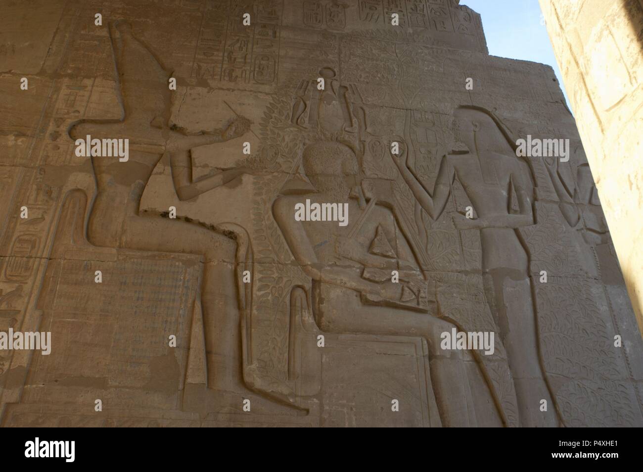 Ramesseum. Relief depicting the pharaoh Ramses II before god Seshat ...