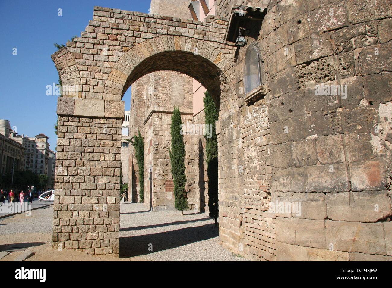 Roman Art. Ruins ot the roman wall and two arches from the aqueduct ...
