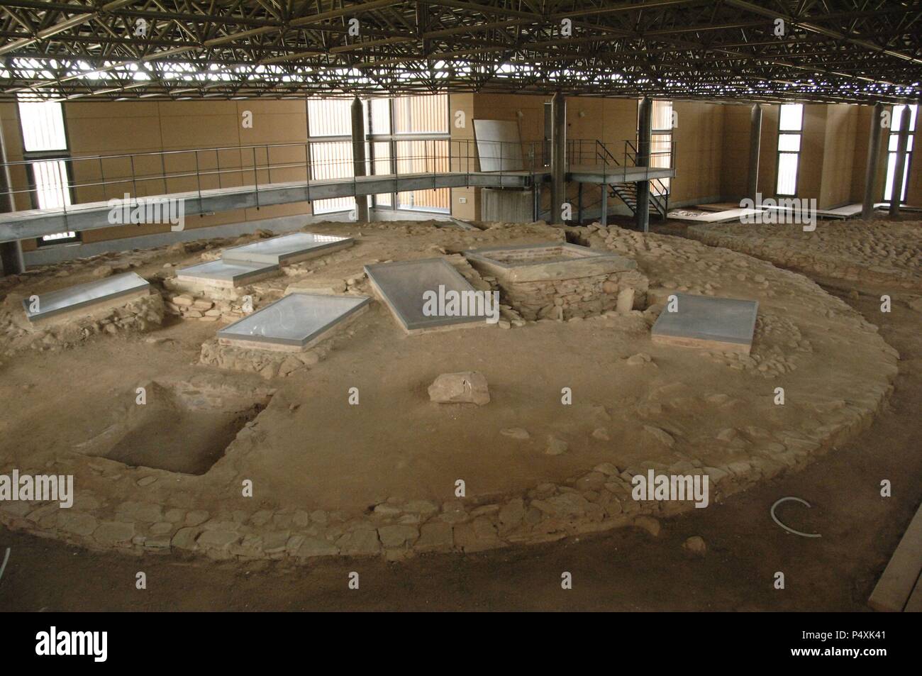 Cemetery of Vranas. Burial mound formed by a double circle of stones ...