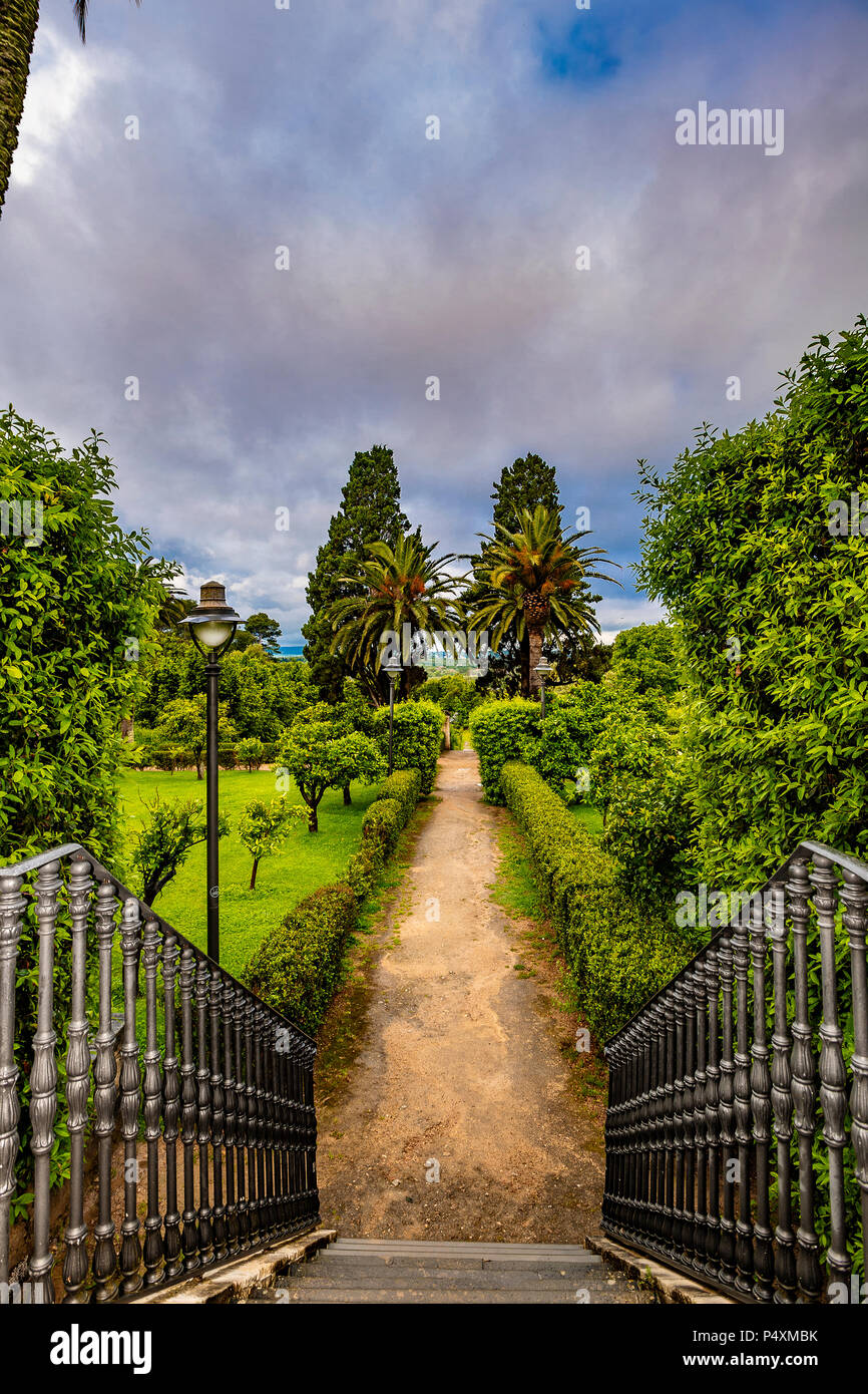 Italy Sardinia Sassari Monserrato Park entrance, bordered by cypresses ...