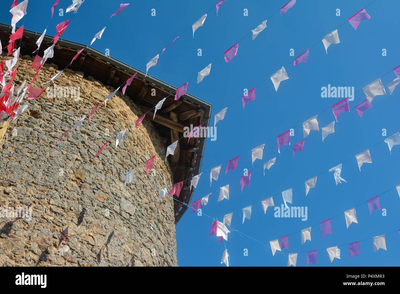 small flags stretched on a rope Stock Photo - Alamy