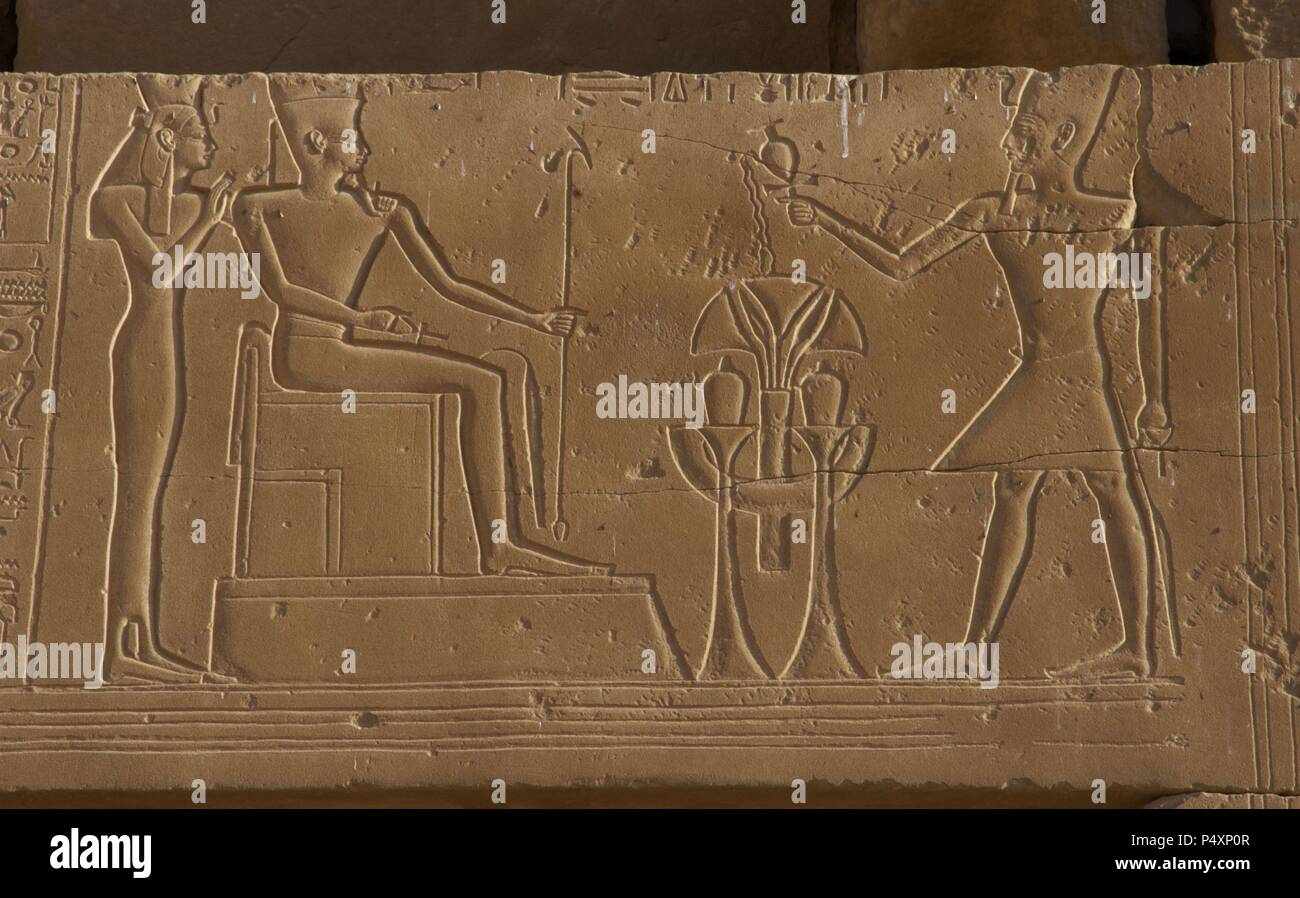 Ramesseum. Relief depicting the pharaoh making an offering to the god ...