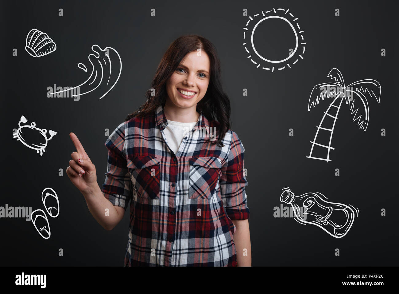Cheerful student smiling and imagining her perfect holidays Stock Photo ...
