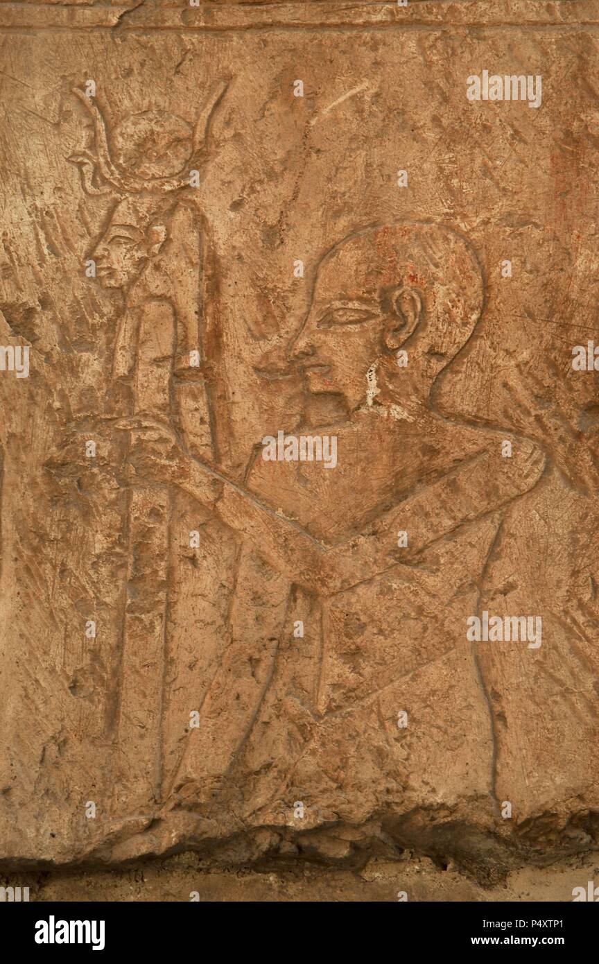 Egyptian Art. Relief depicting a priest carrying the image of the ...