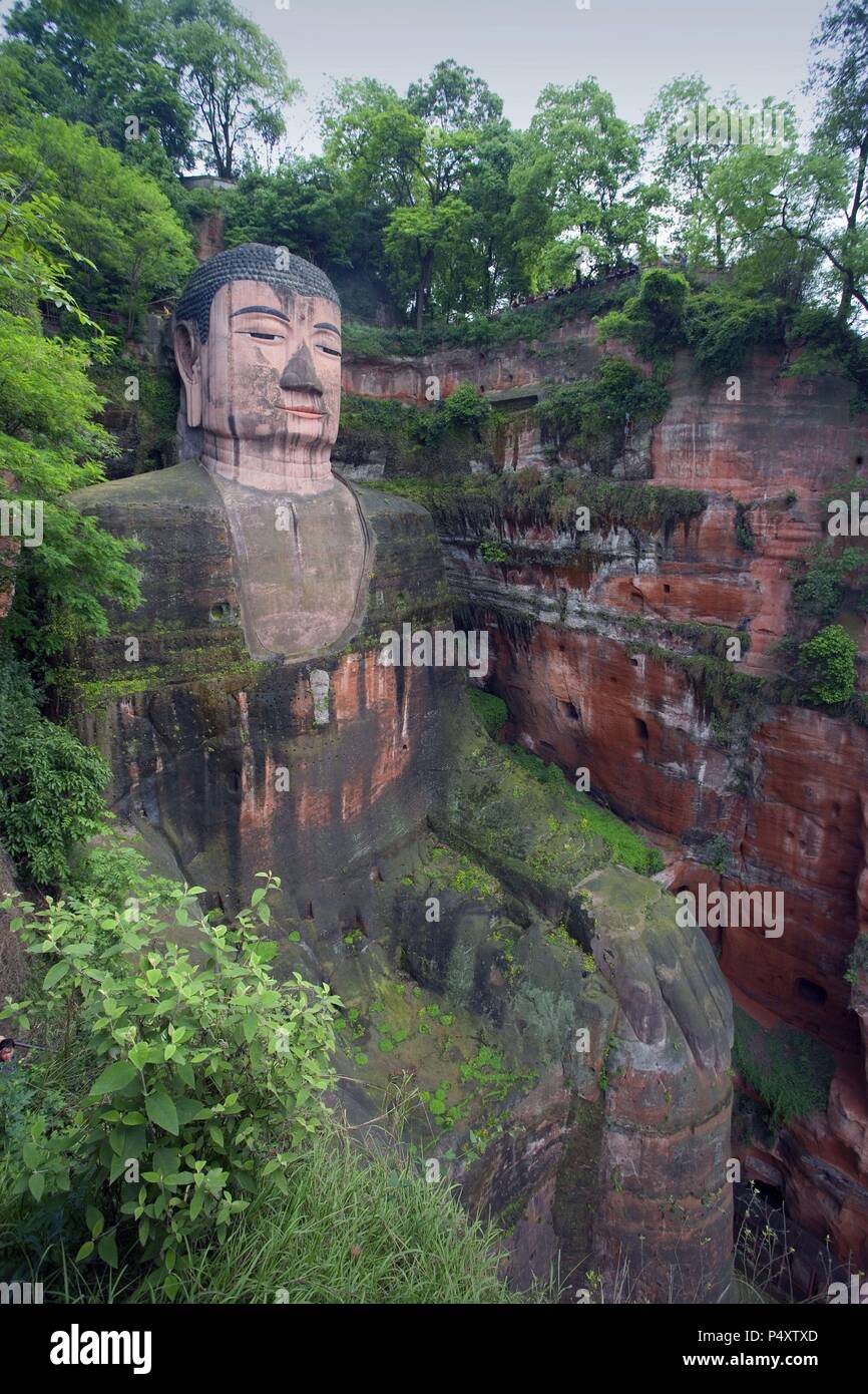 Leshan Giant Buddha (713-803). Carved into a cliff of Mount Lingyun ...