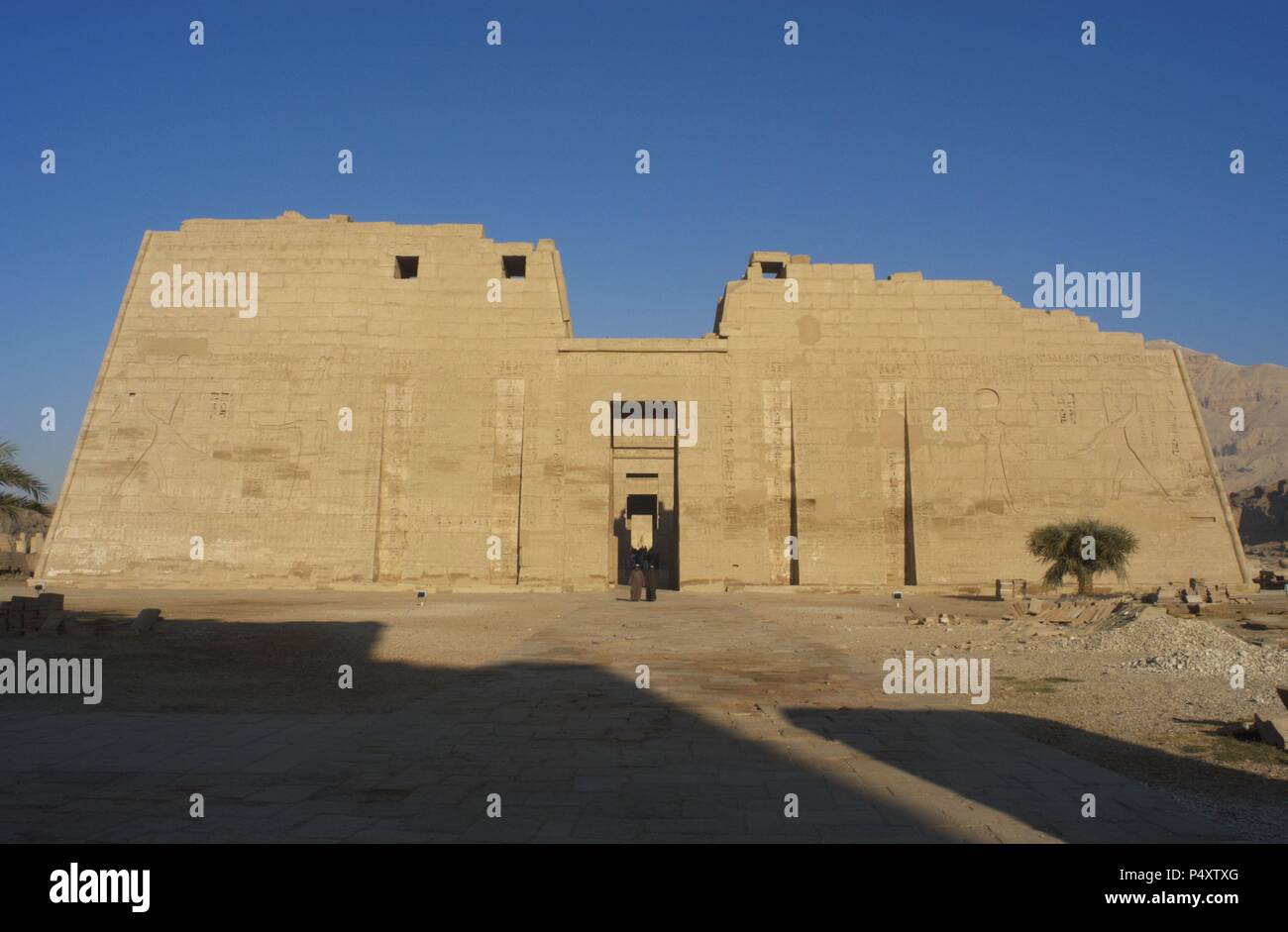 Temple of Ramses III. First pylon with reliefs depicting battle escenes ...