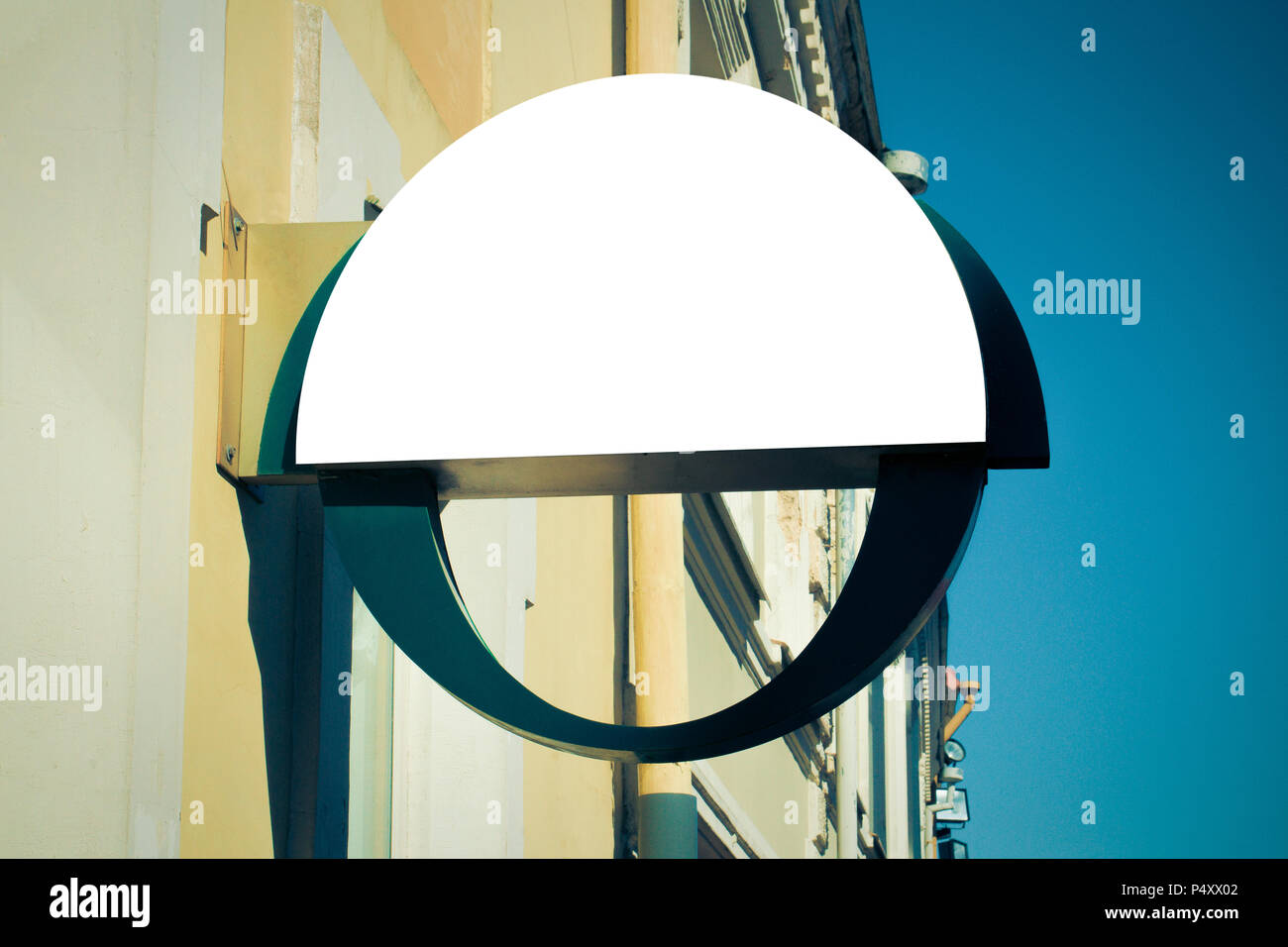 Mock up. Blank white signage on the wall of classical architecture ...