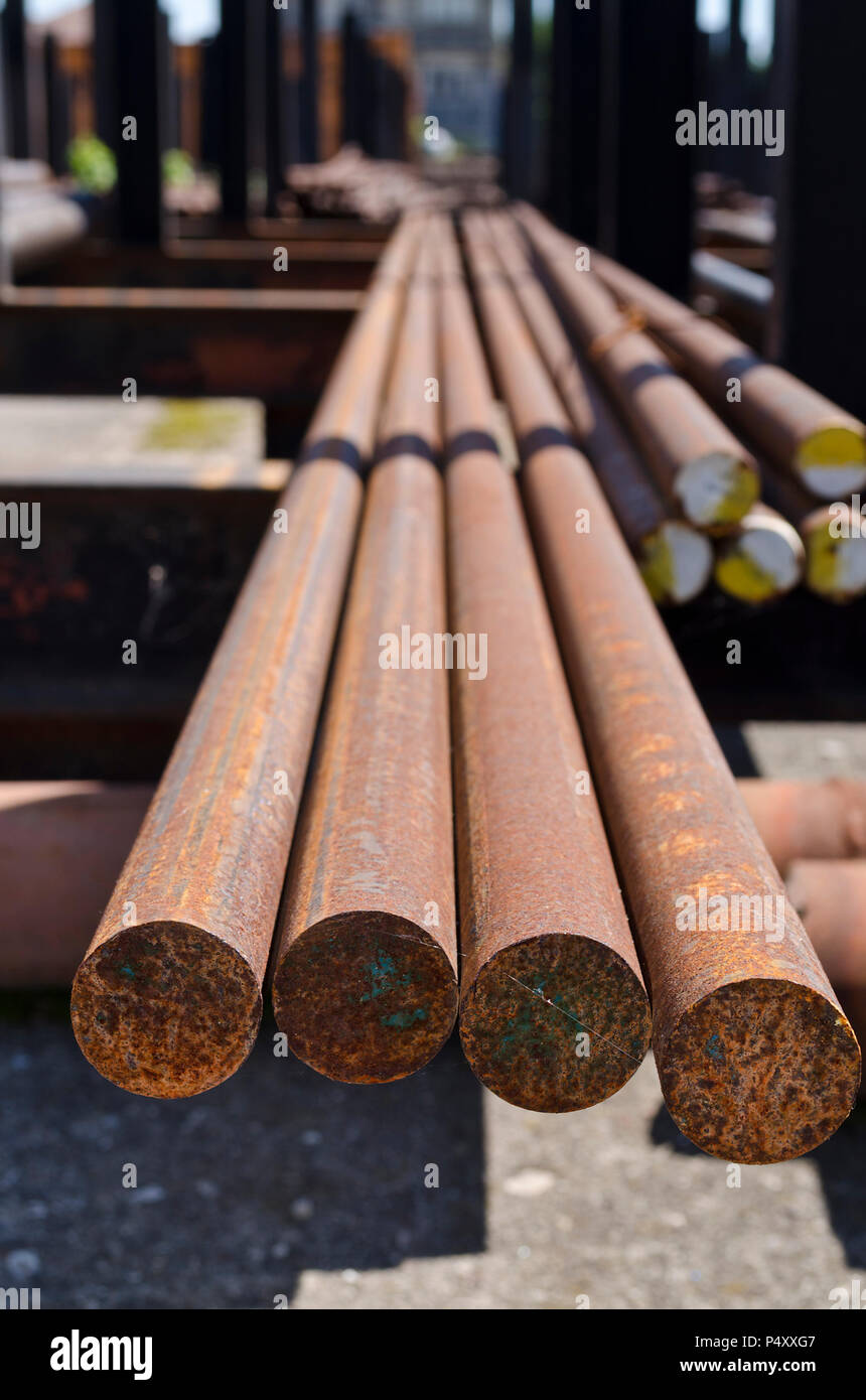 Metal raw material in the form of long tubes Stock Photo - Alamy