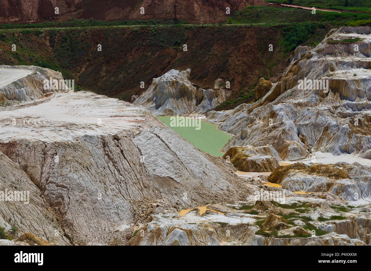 Stone quarry with excavate - Open pit mine Stock Photo - Alamy